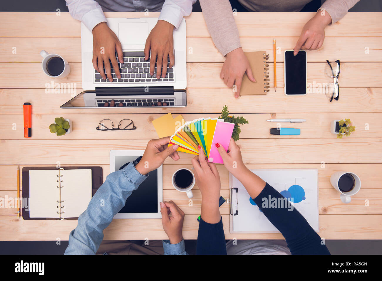 Concept of designer teamwork brainstorming planning meeting Stock Photo ...