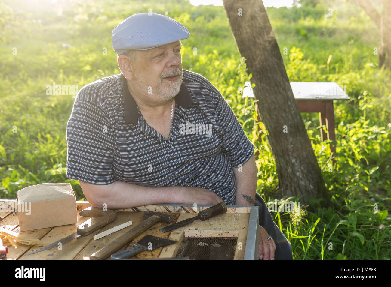 Outdoor portrait of elderly bee-keeper Stock Photo - Alamy