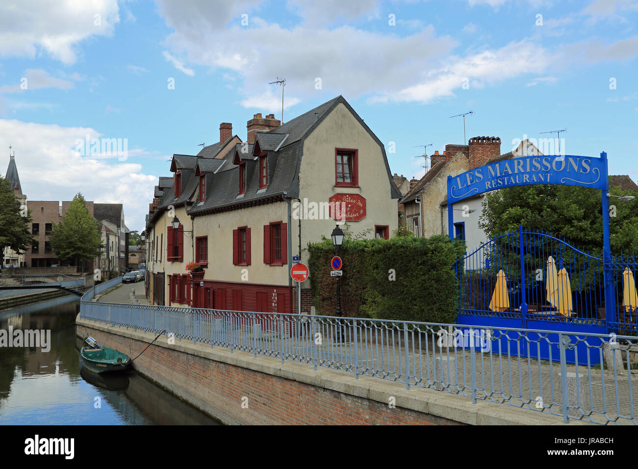 Canal, boat and Rue d'Engoulvent in Amiens, Somme, Hauts de France ...