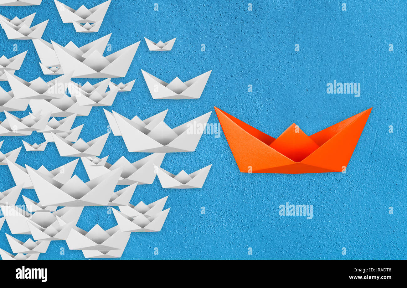 leadership concept with paper boat leading Stock Photo - Alamy