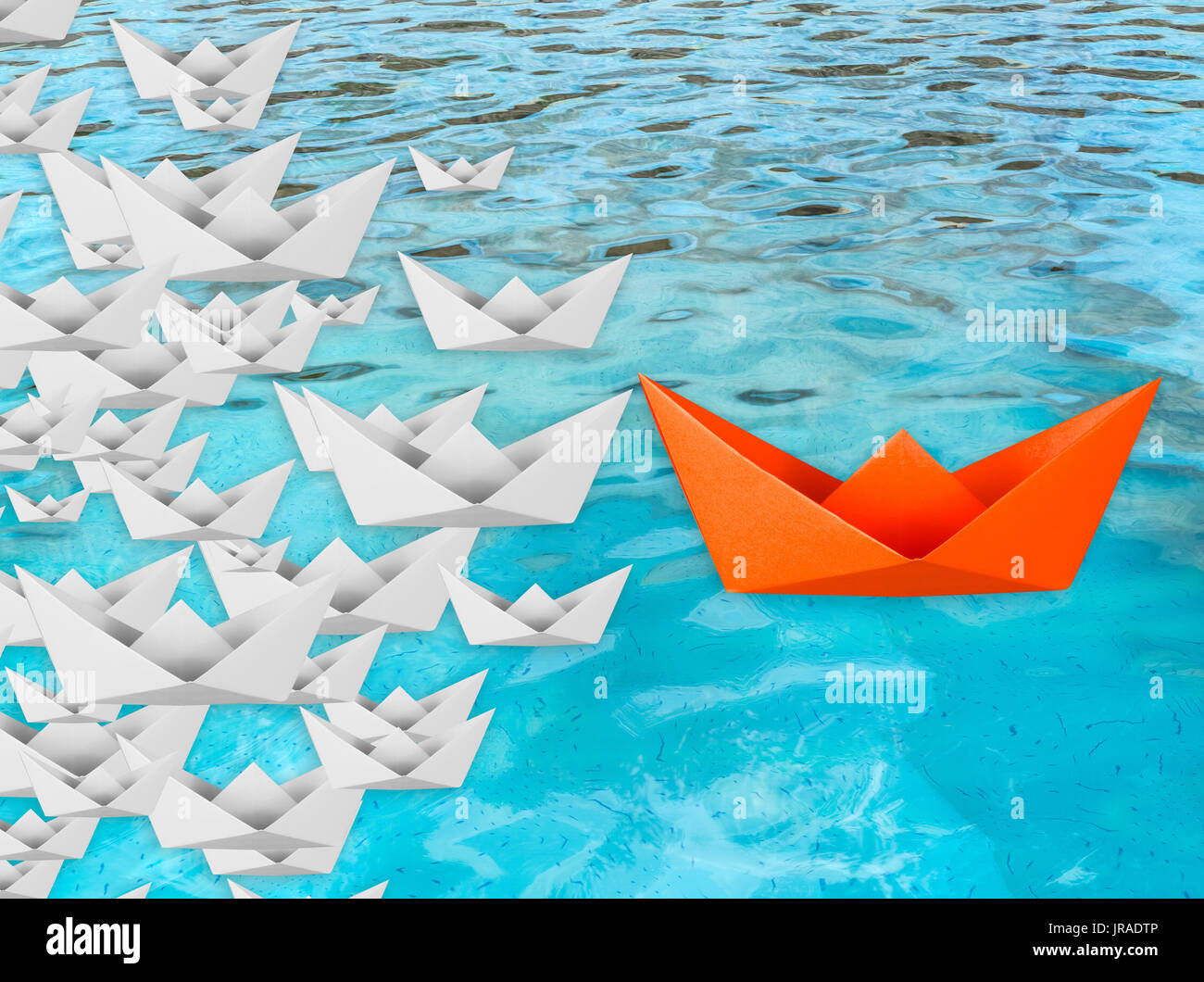 leadership concept with paper boat floating Stock Photo - Alamy