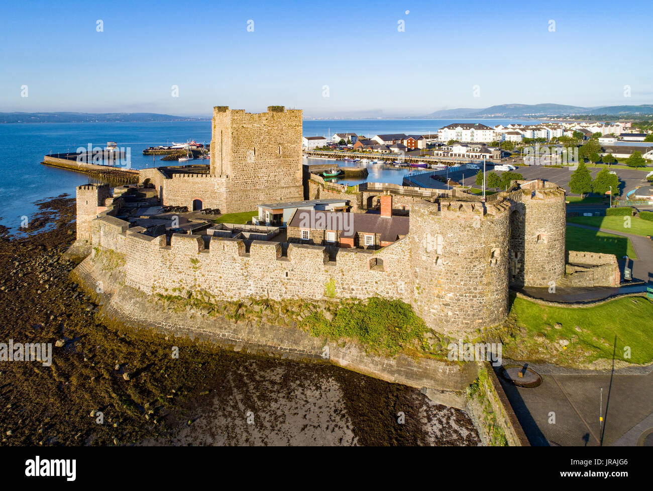 Medieval Norman Castle in Carrickfergus near Belfast in sunrise light ...