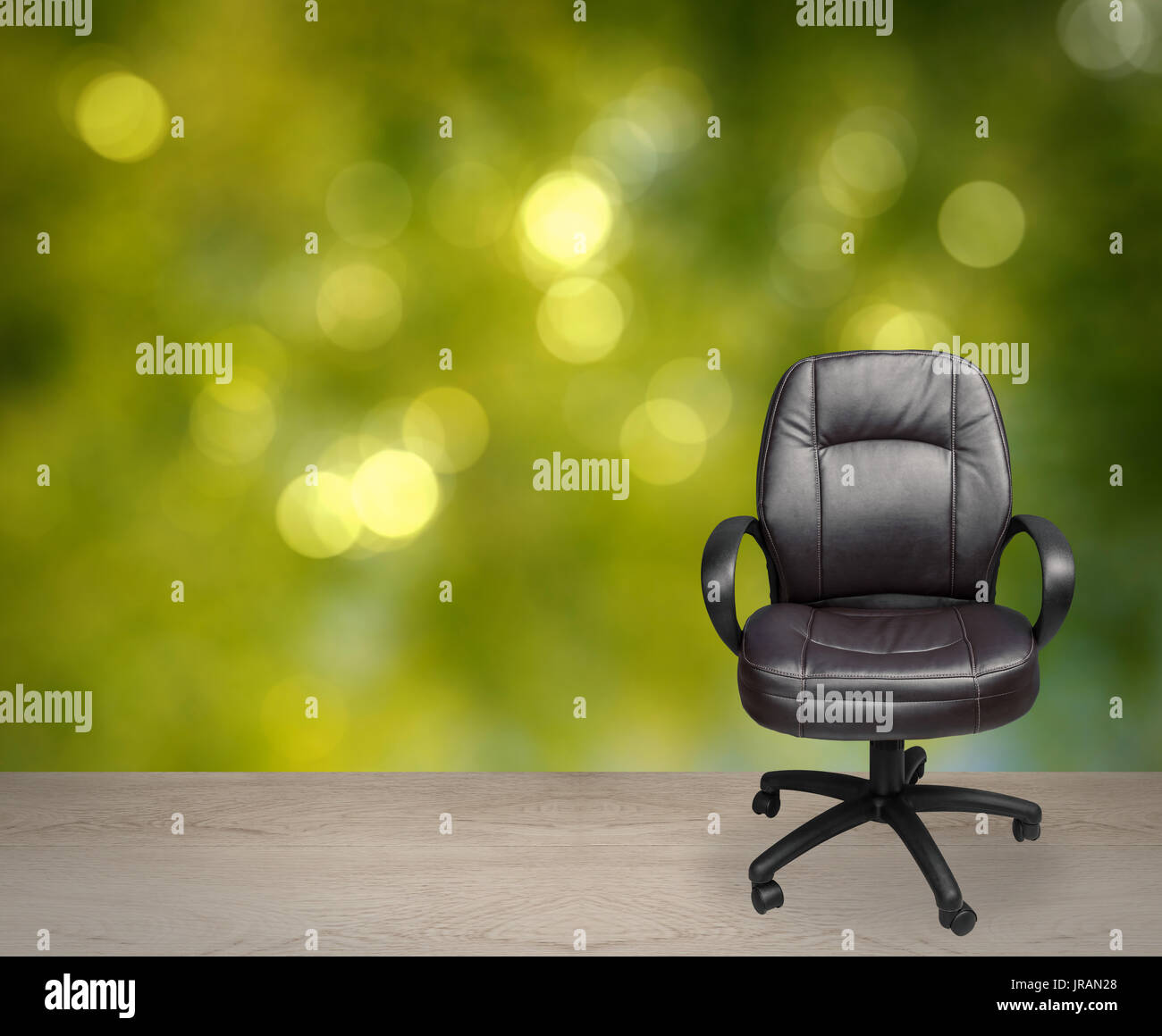 empty office chair with green background Stock Photo - Alamy