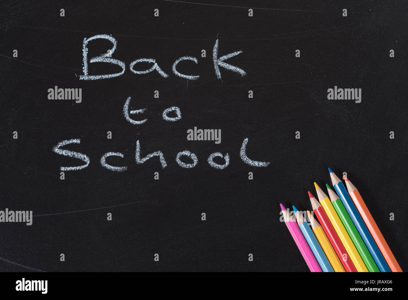 Back to School concept with a colorful set of pencil crayons in the ...