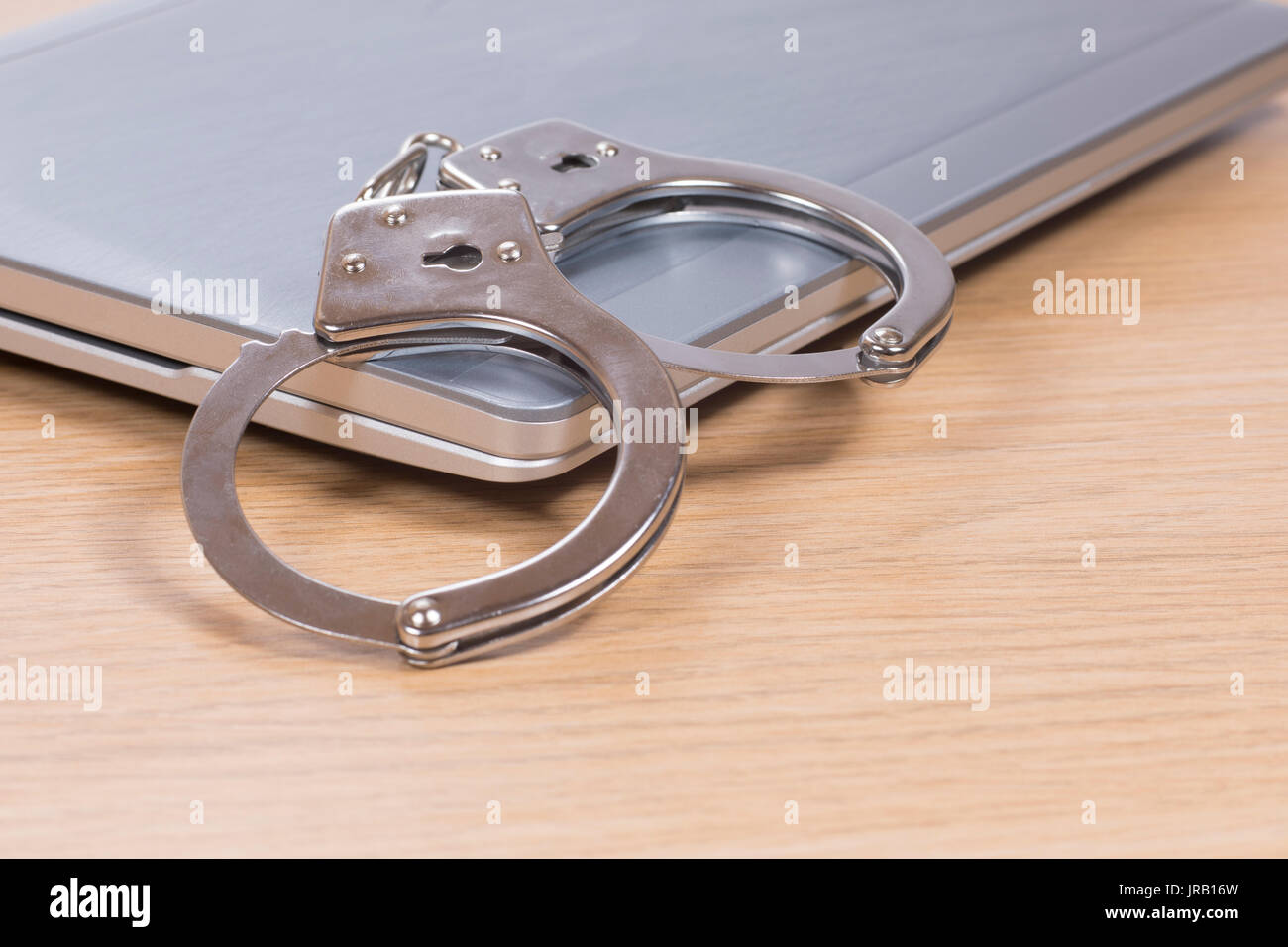 Toy handcuffs hi-res stock photography and images - Alamy
