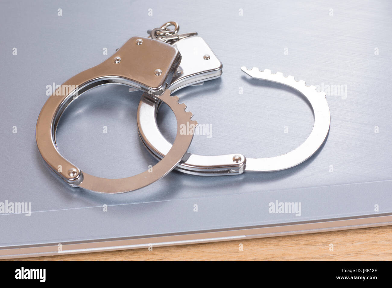 Unlocked handcuffs hi-res stock photography and images - Alamy