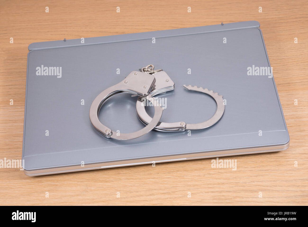 Open handcuffs hi-res stock photography and images - Alamy