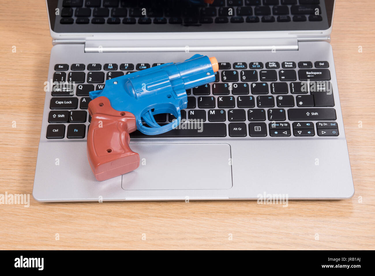 Keyboard pistol hi-res stock photography and images - Alamy