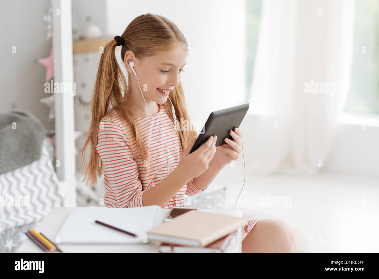 Child watching cartoons hi-res stock photography and images - Alamy