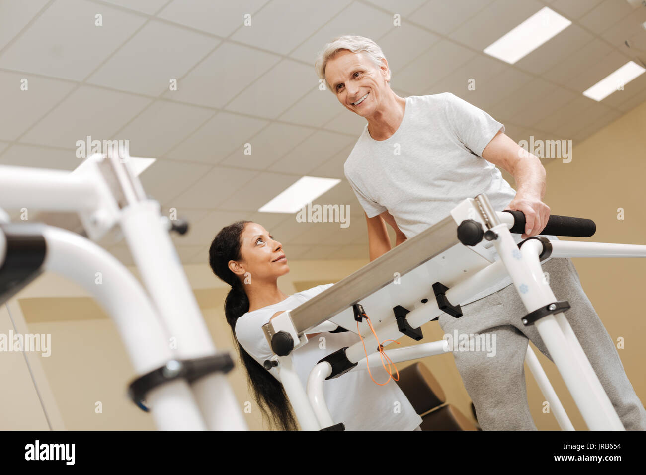 Positive delighted retirement doing sport exercises Stock Photo - Alamy