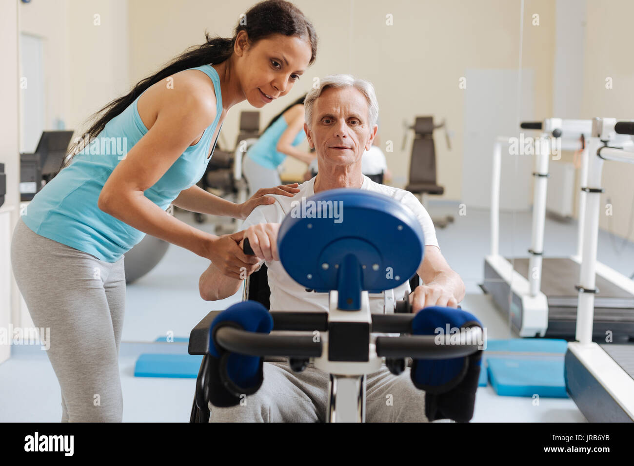 Attentive man doing sport tasks Stock Photo - Alamy