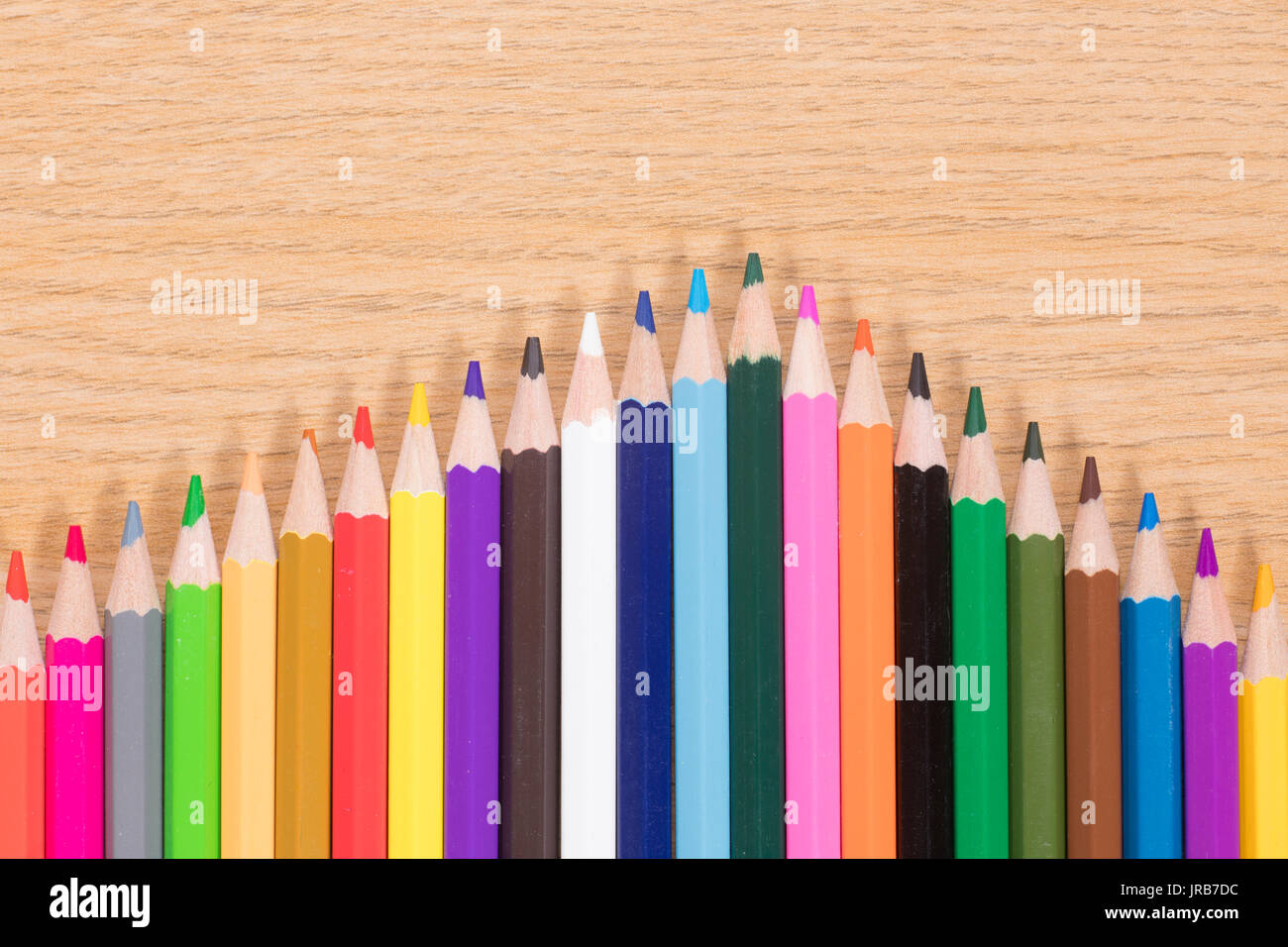 Colorful still life arrangement of pencil crayons in the colors of the ...