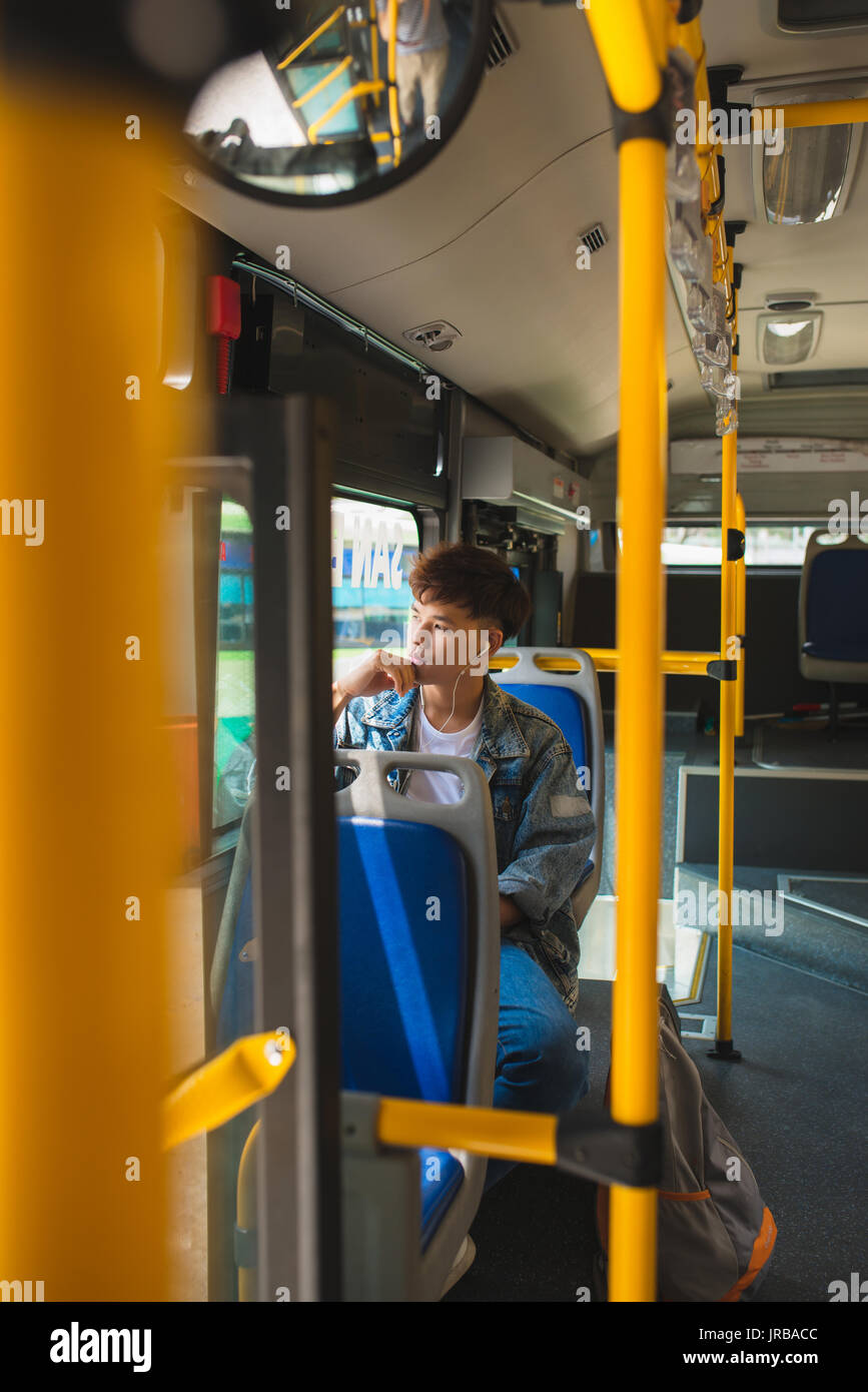 Man looking through bus window High Resolution Stock Photography and ...