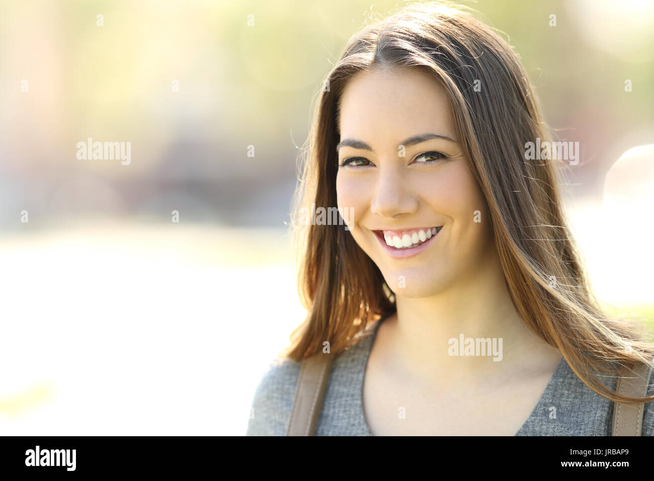Woman standing looking proud hi-res stock photography and images - Alamy