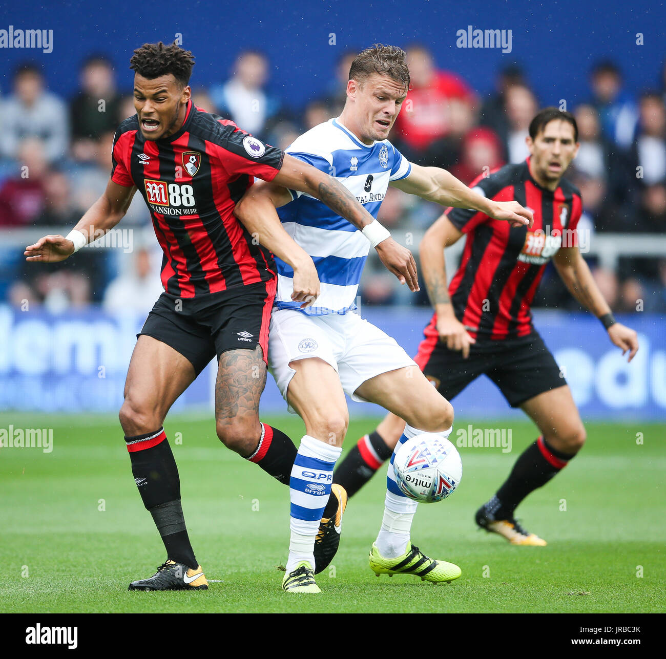 Queens Park Rangers' Matt Smith in action with Bournemouth's Tyrone ...