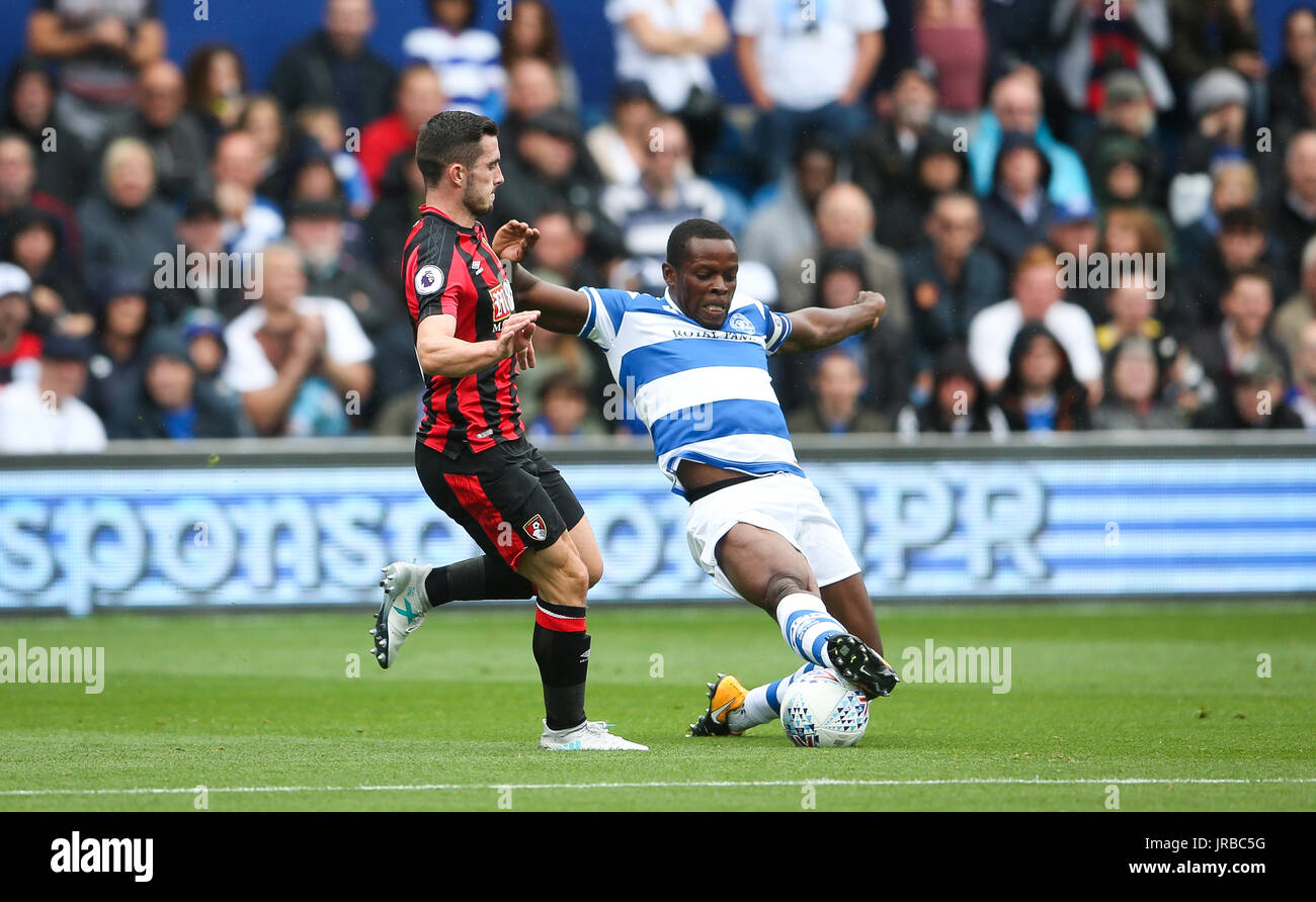Queens Park Rangers' Nedum Onuoha (right) in action with Bournemouth's ...