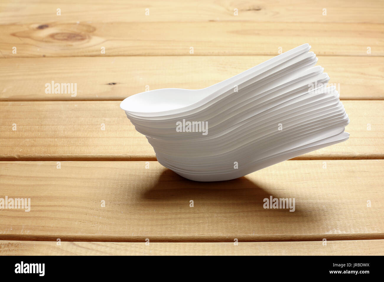 Plastic spoons hi-res stock photography and images - Alamy