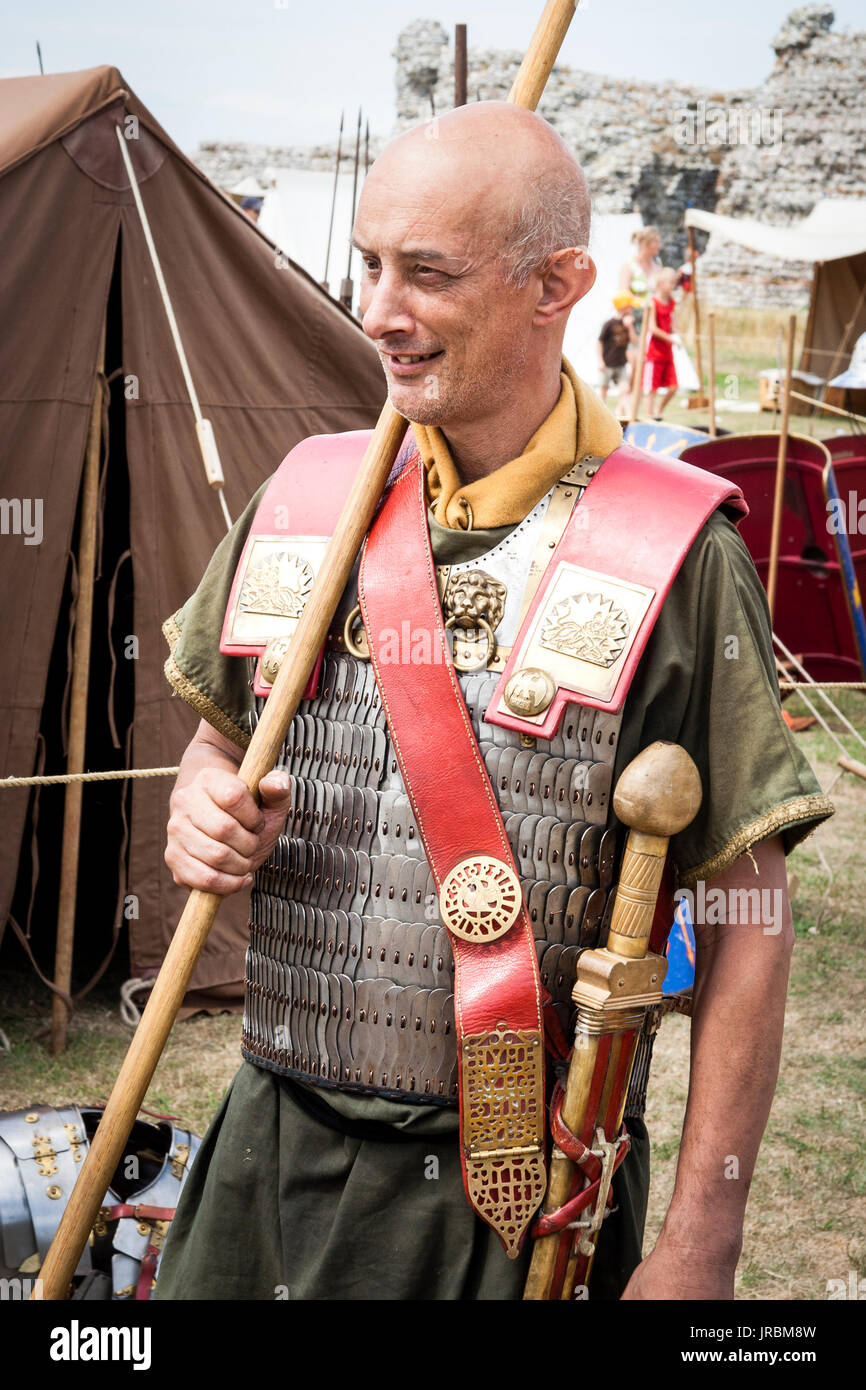Living history re-enactor dressed in Roman legionary uniform and armour ...