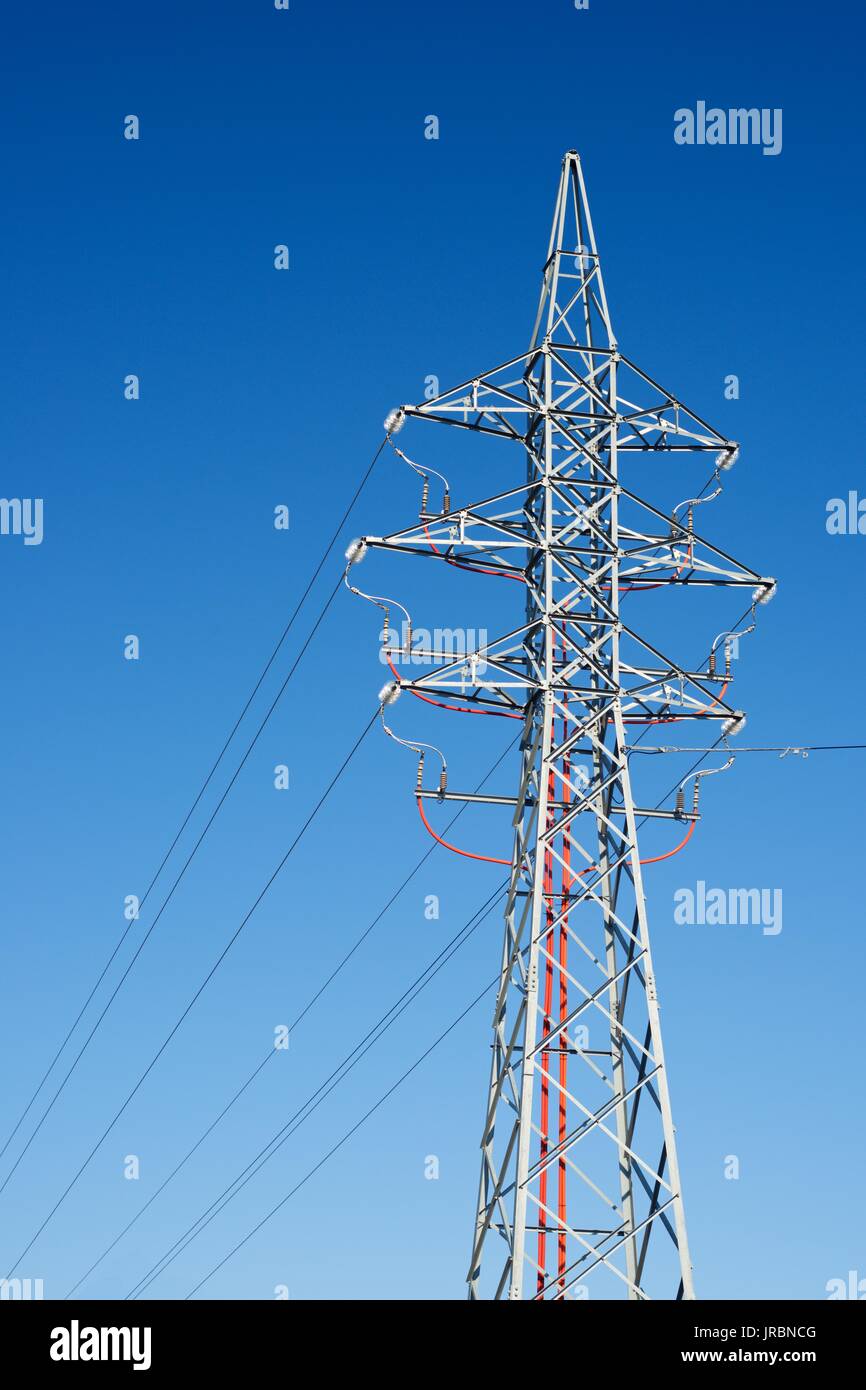 Power line with clear blue sky Stock Photo - Alamy