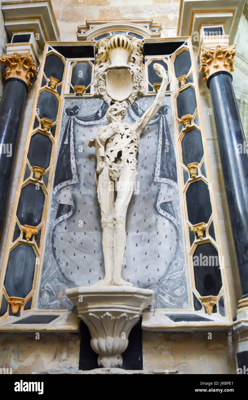 Statue in the shape of a skeleton indicating the ossuary of the Church ...