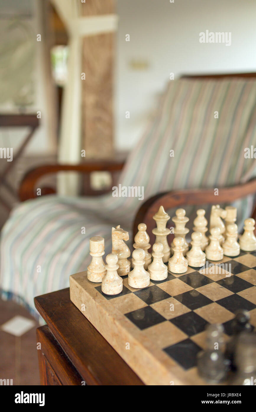 Beautiful stone chess board close-up in cozy living room Stock Photo ...