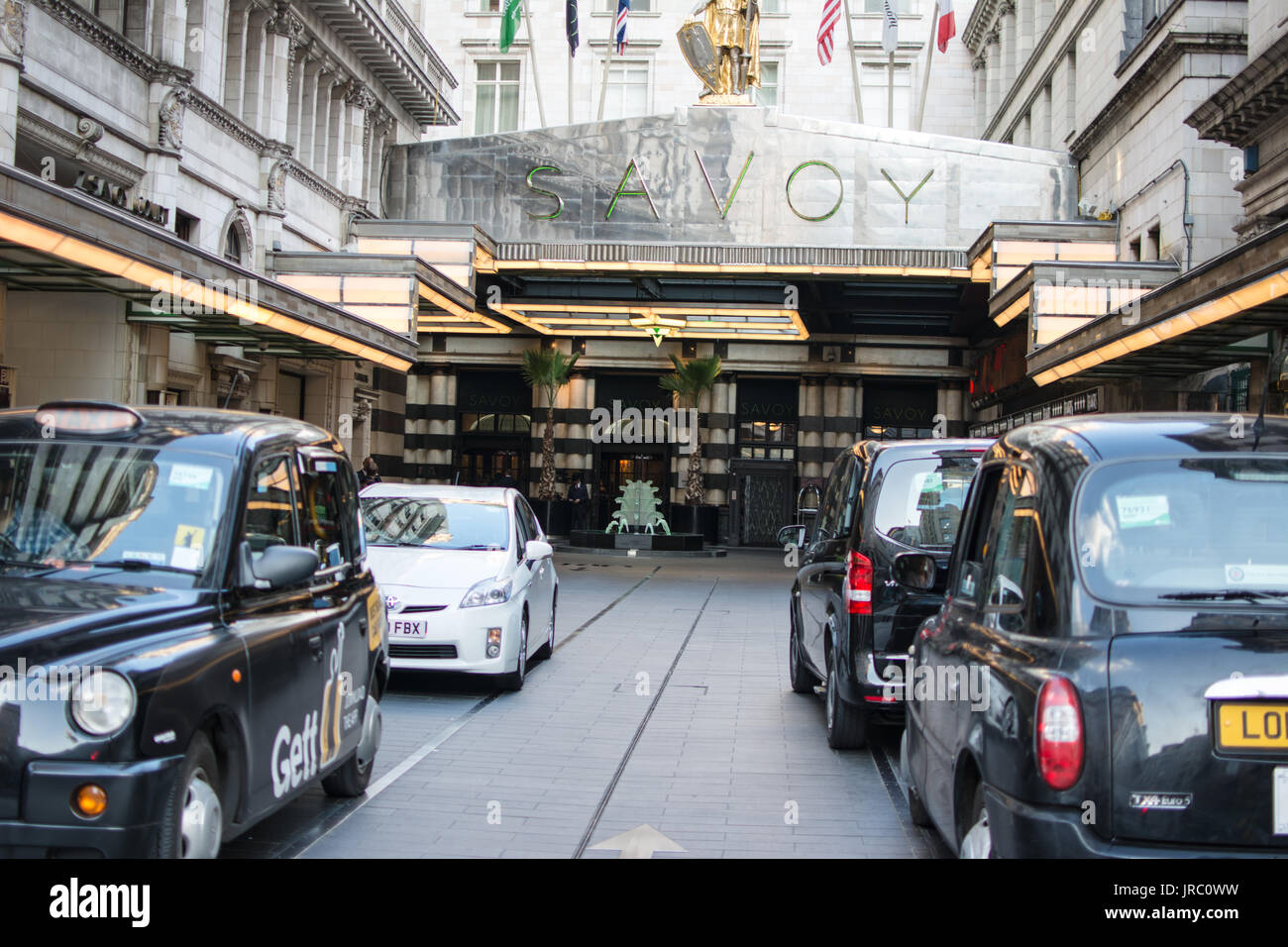 The Savoy hotel London taxi taxis black sign signs main entrance City ...
