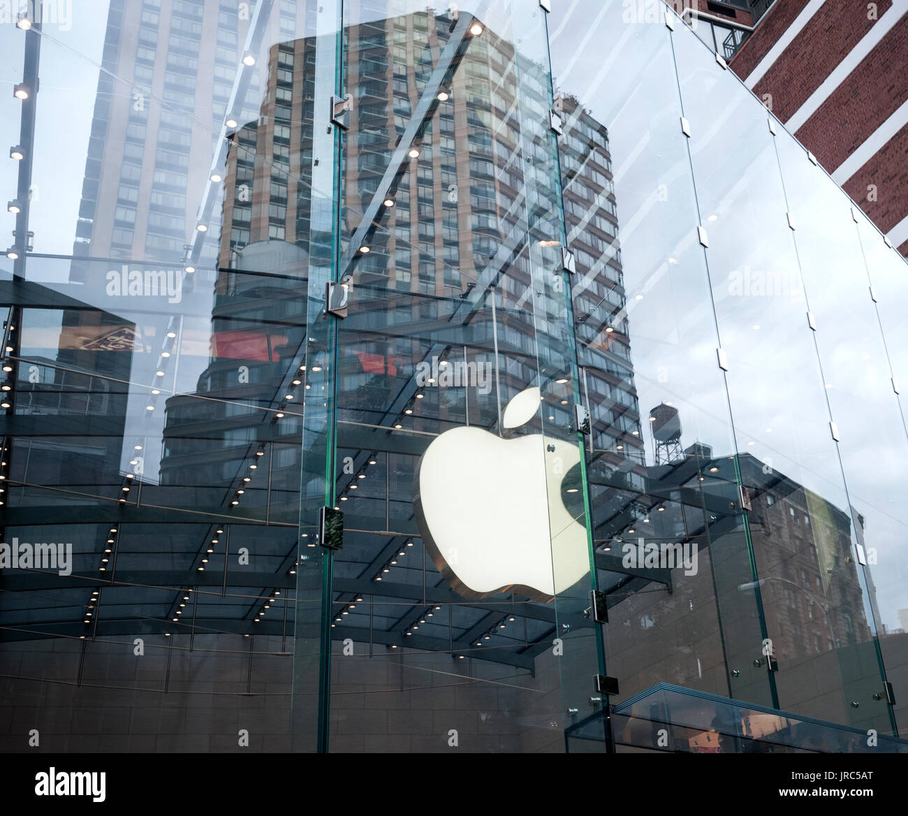 The Apple shines over the Upper West Side neighborhood Apple store in ...