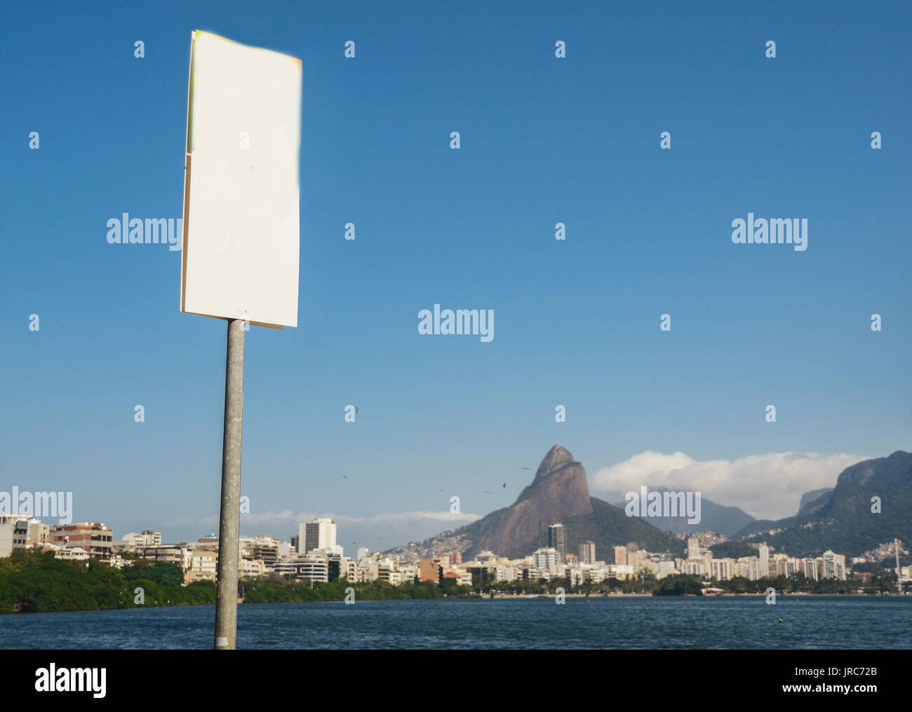An empty sign overlooking the iconic Lagoa de Rodrigo de Freitas in Rio ...