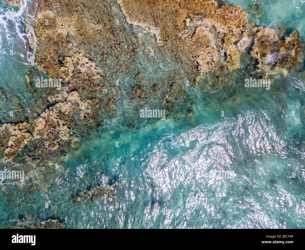 Aerial view of rocks on the sea. Overview of the seabed seen from above ...