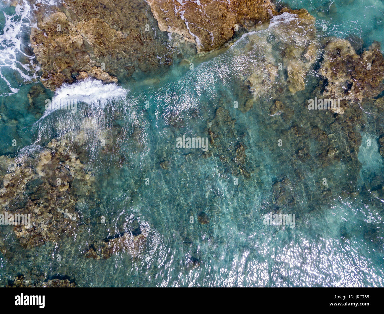 Aerial view of rocks on the sea. Overview of the seabed seen from above ...