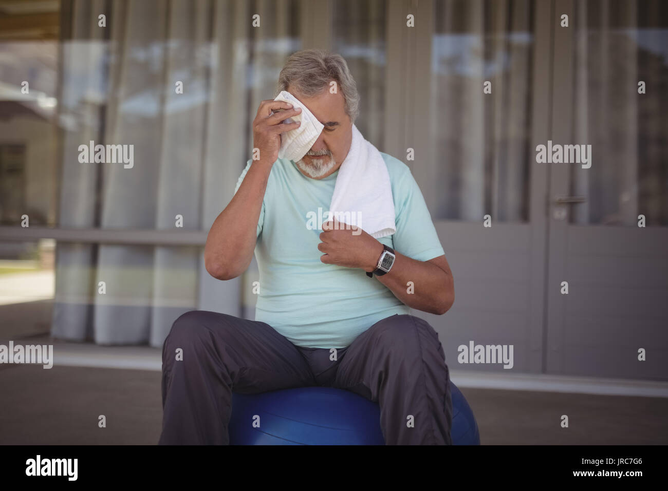 Wiping off sweat hi-res stock photography and images - Alamy