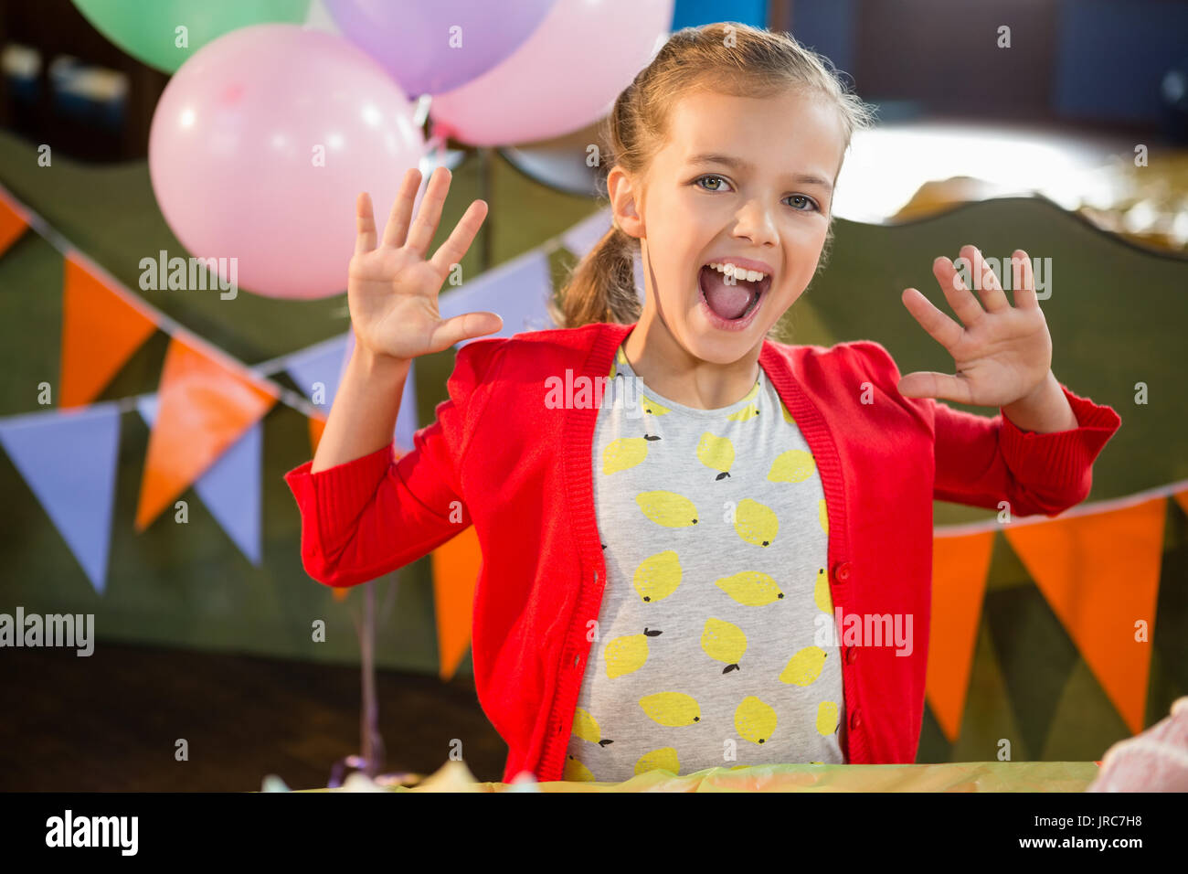Portrait of excited girl in birthday party at home Stock Photo - Alamy