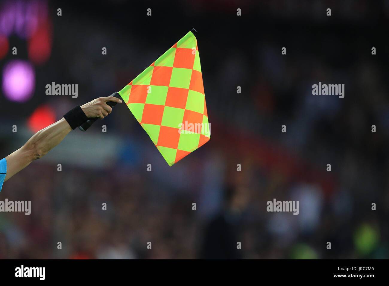 assistant referee, assistant flag, offside Stock Photo - Alamy