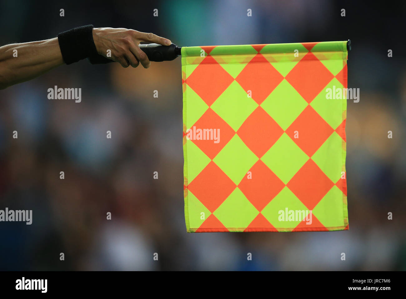 assistant referee, assistant flag, offside Stock Photo - Alamy
