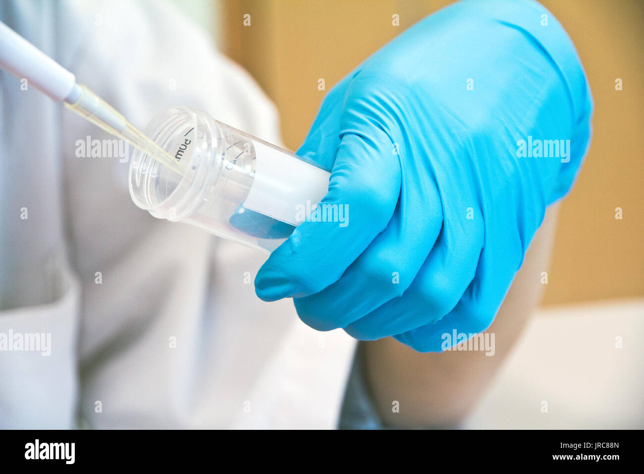 Research scientist,Pipette with drop of liquid in test tube Stock Photo ...
