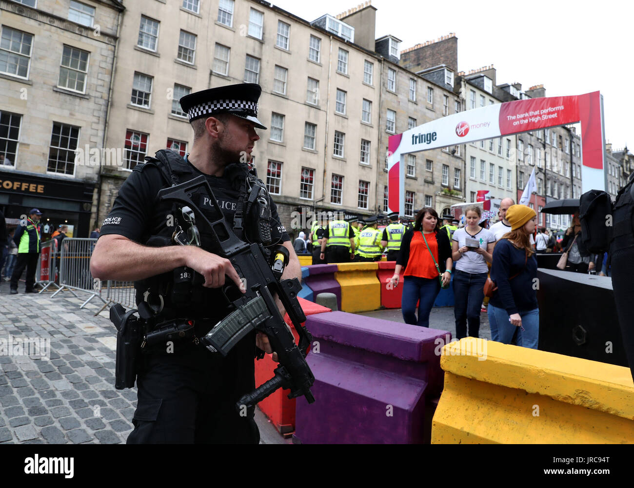 An armed police officer on duty on the Royal Mile in Edinburgh, as the ...