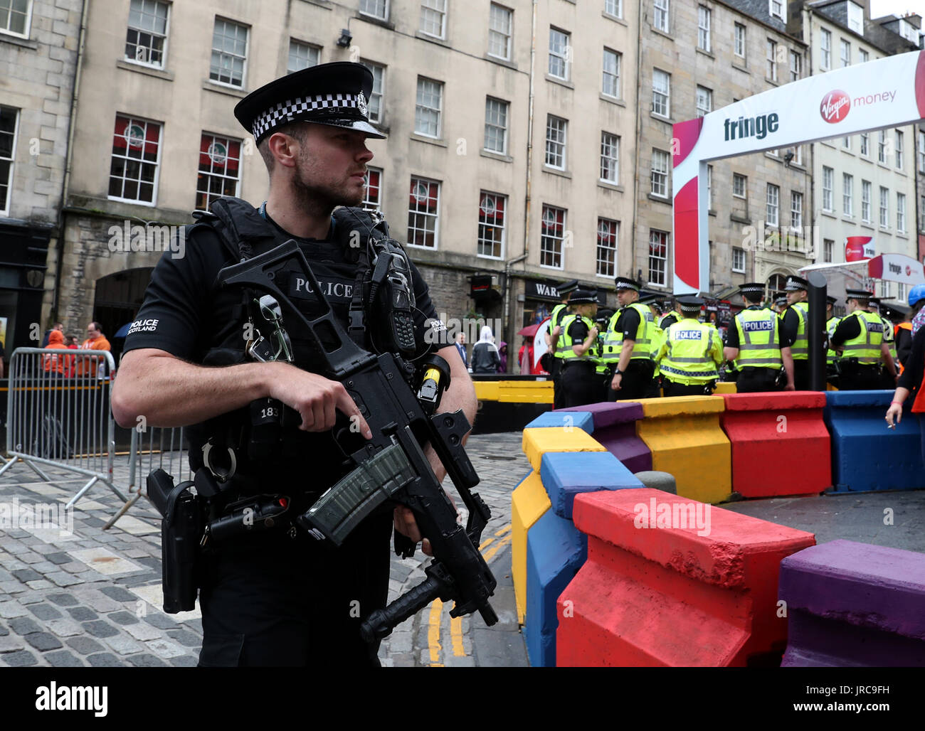 An armed police officer on duty on the Royal Mile in Edinburgh, as the ...