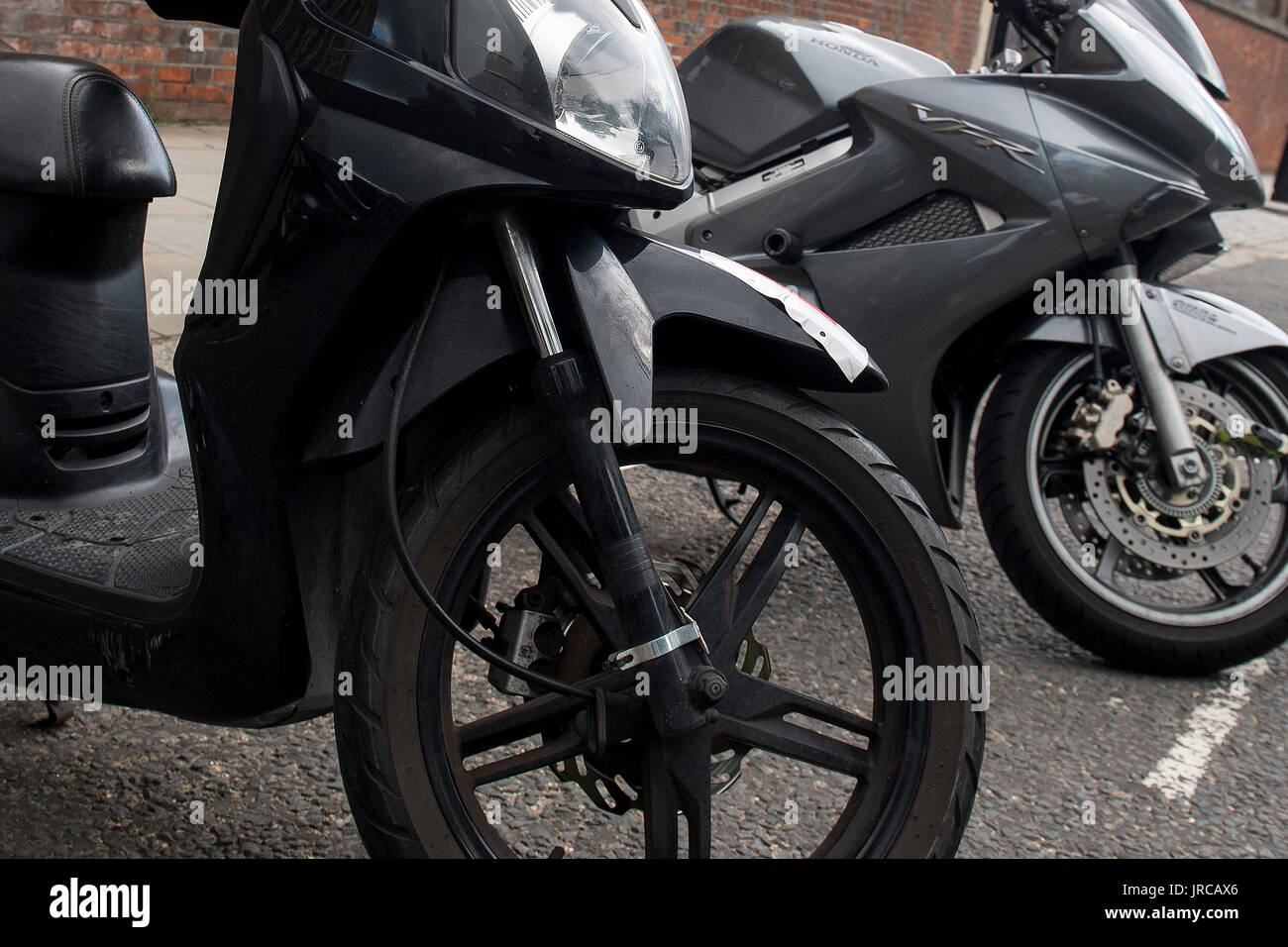 Moped stock in central London Stock Photo - Alamy