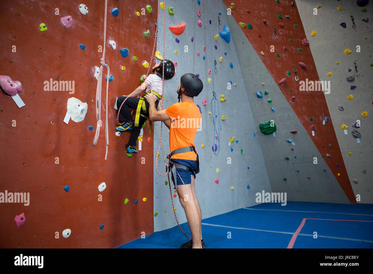 Helping indoor climbing rope hi-res stock photography and images - Alamy