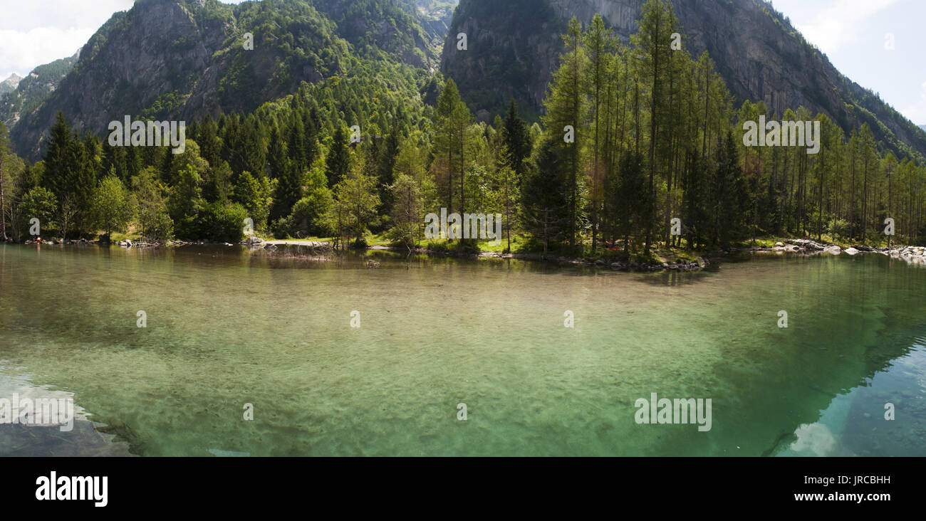Italy: view of the alpine lake in the Mello Valley, green valley ...