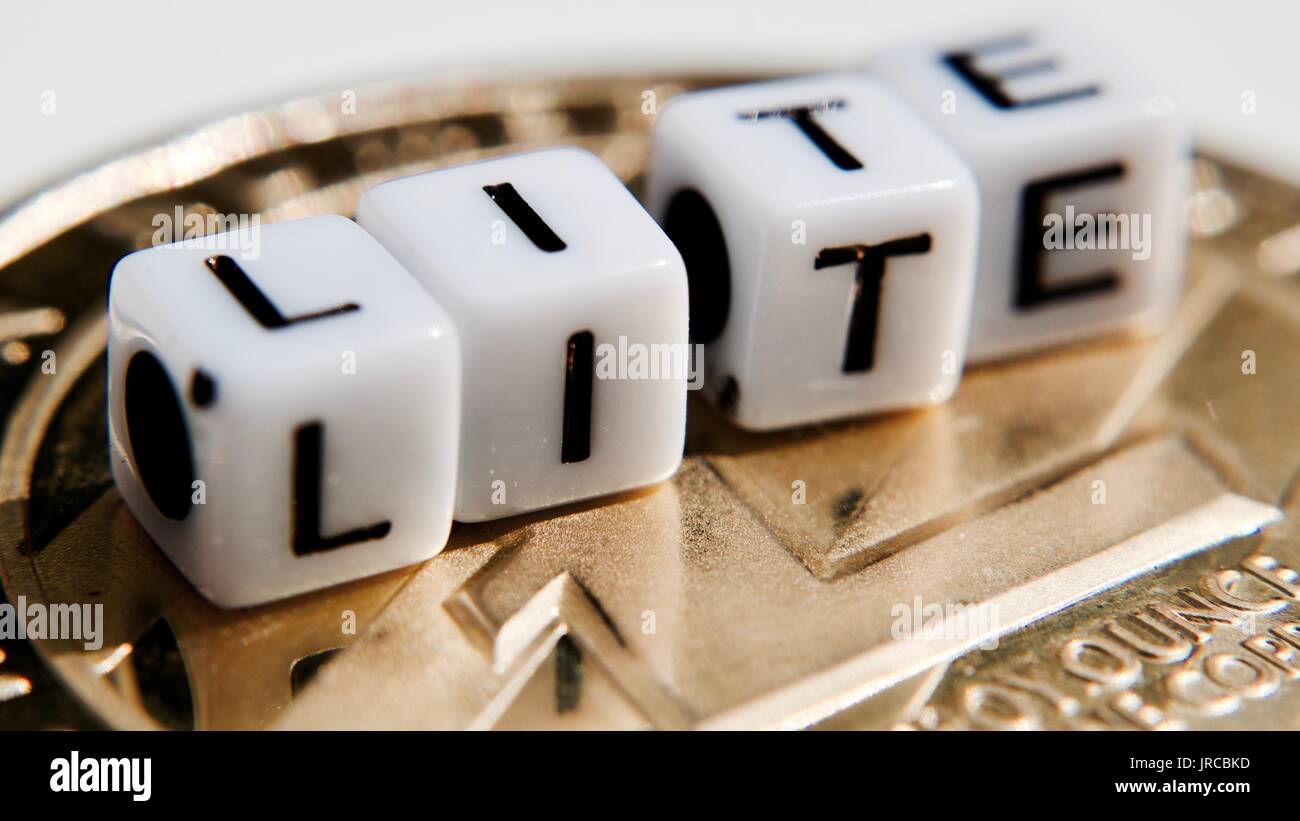 Digital currency physical metal litecoin coin. Virtual cash concept ...