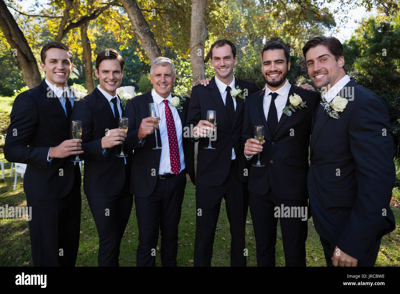 Groomsmen holding glass hi-res stock photography and images - Alamy