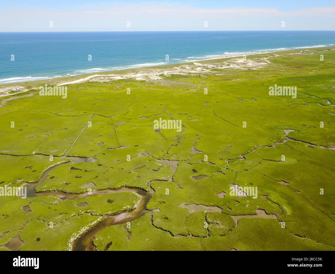 Channels wind through a marsh on Cape Cod, MA. Marshes and wetlands ...