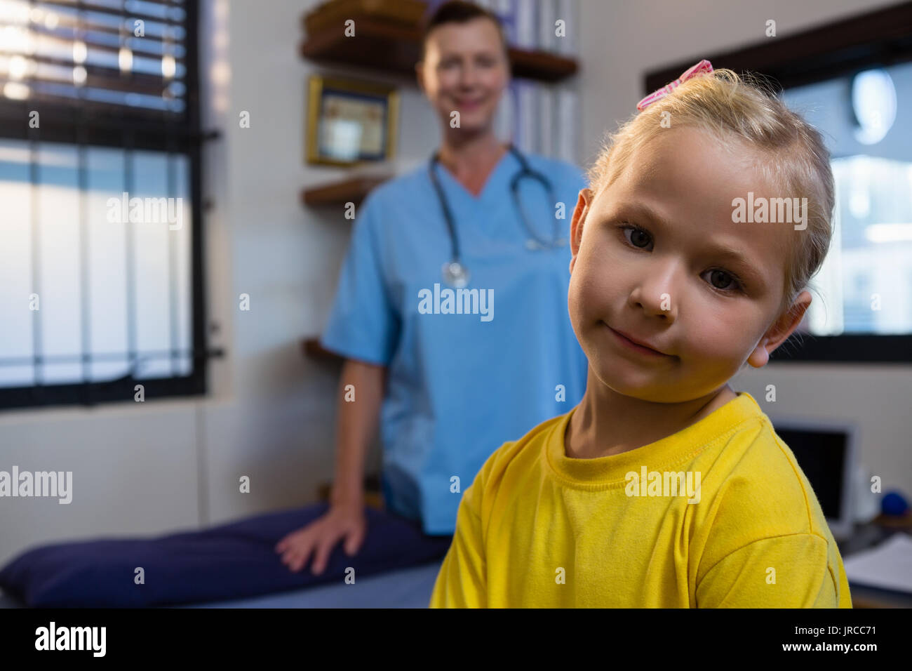 Portrait of cute smiling girl in hospital Stock Photo - Alamy