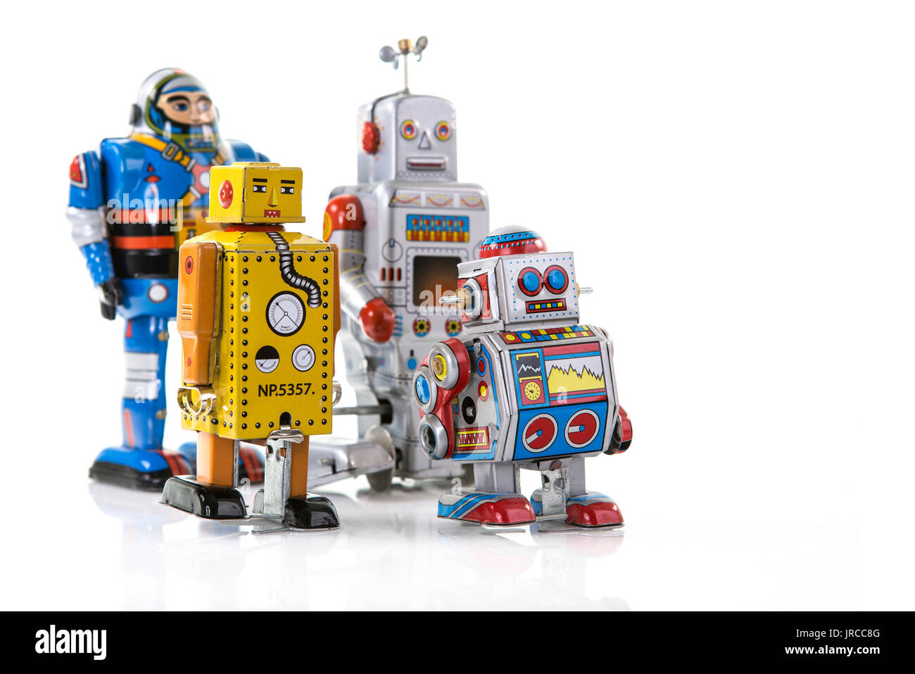 Group of Retro Tin Robots on a white background with copy space Stock ...