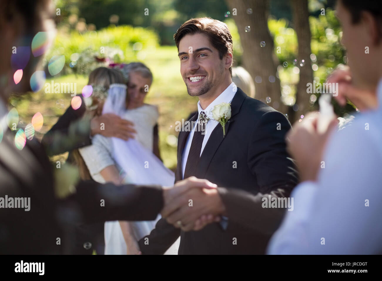 Shaking hand park hi-res stock photography and images - Alamy