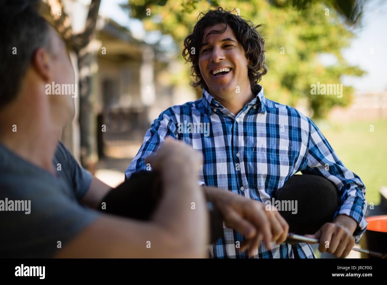 Two male friends talking other hi-res stock photography and images - Alamy