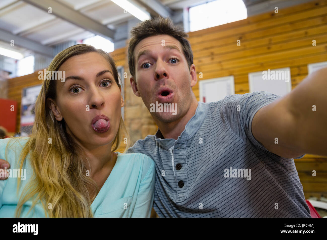 Raised faces hi-res stock photography and images - Alamy