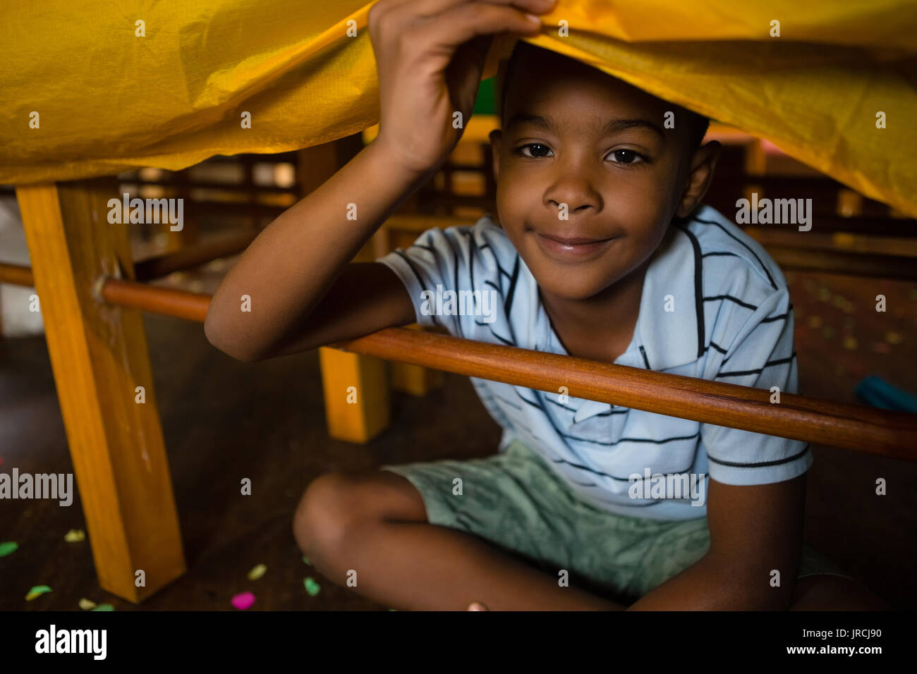 Adorable boy sitting party hi-res stock photography and images - Alamy