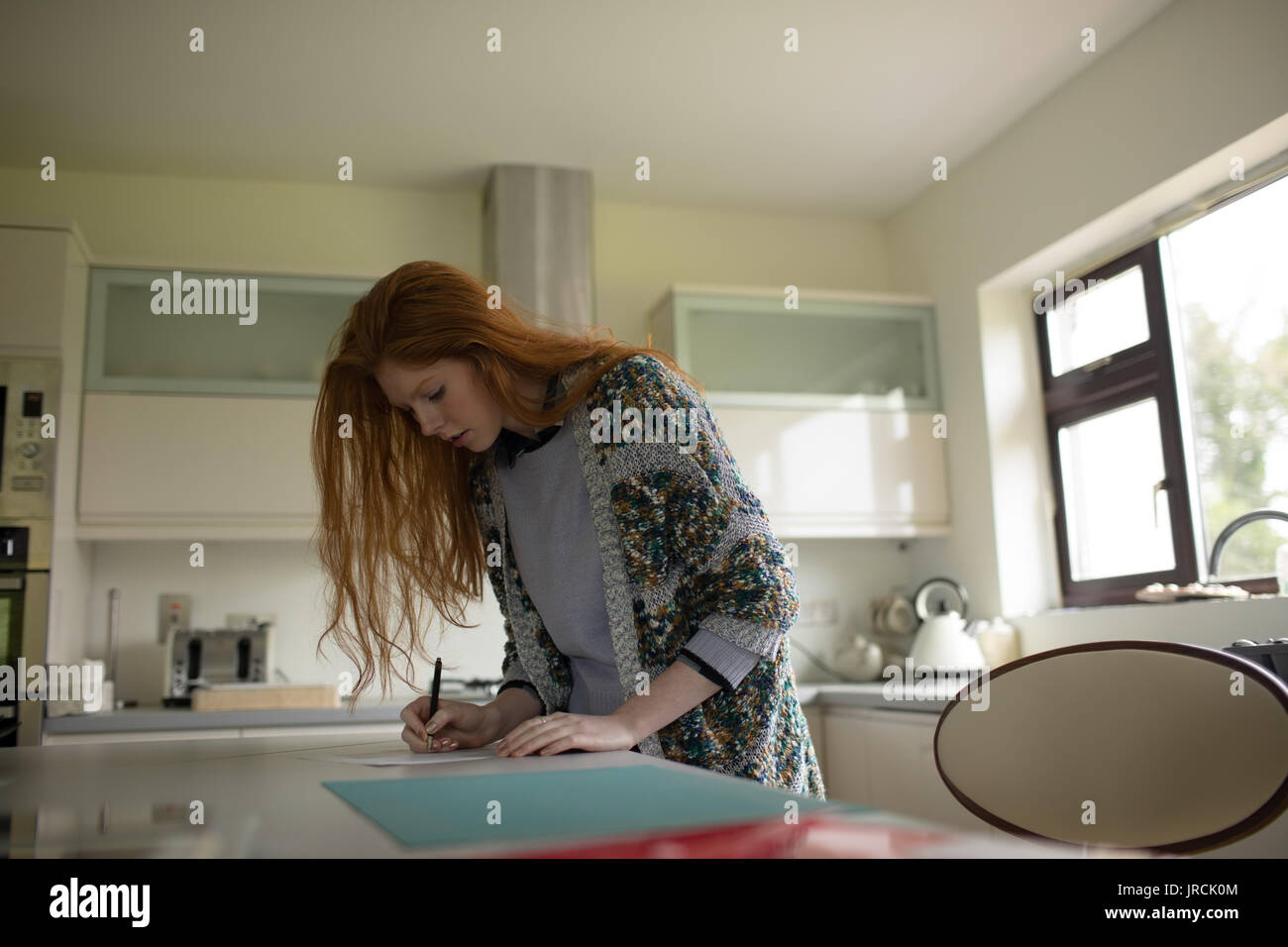 Standing young woman page hi-res stock photography and images - Alamy